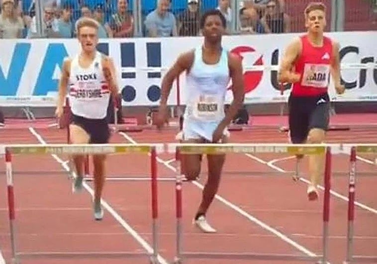 Chris Robinson gana los 400 metros vallas a pesar de correr con el pene ...