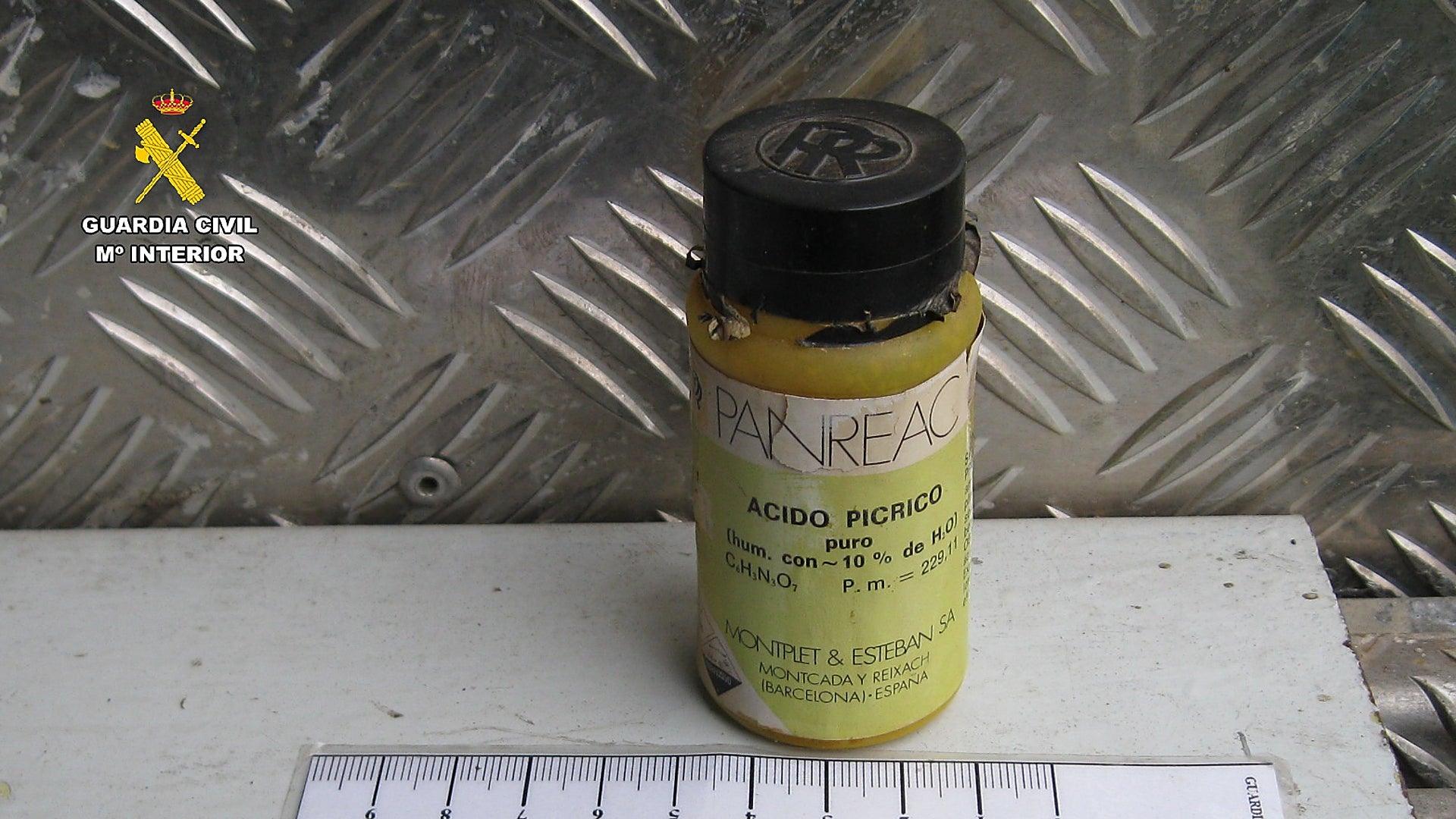 Police bomb squad experts remove canisters of potentially explosive ...